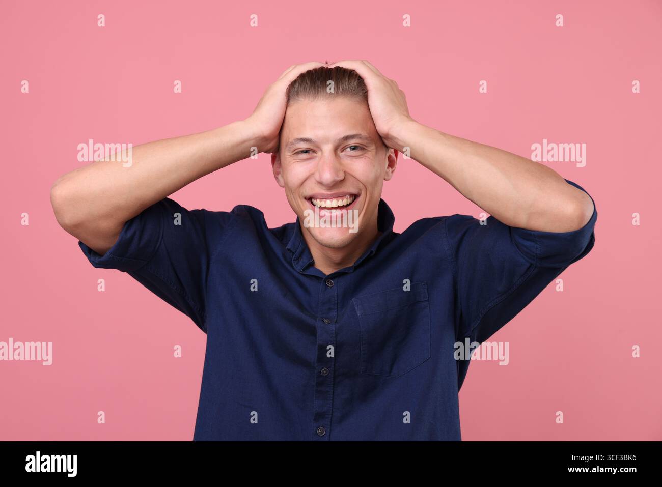 Laughing handsome young male model candid portrait hi-res stock ...