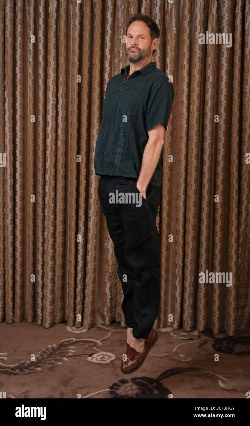 Splitsville" cast member/co-screenwriter Kyle Marvin leaps as he poses ...
