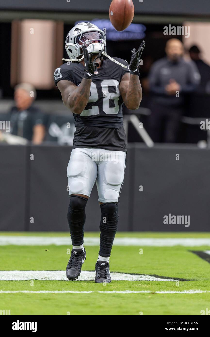 Las Vegas Raiders running back Sincere McCormick (28) warms up before ...