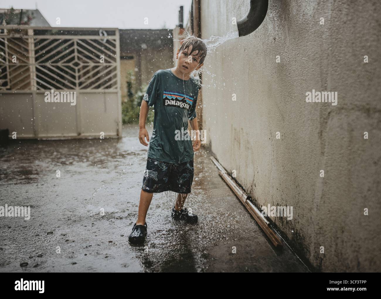 Boy having shower not rain hi-res stock photography and images - Alamy
