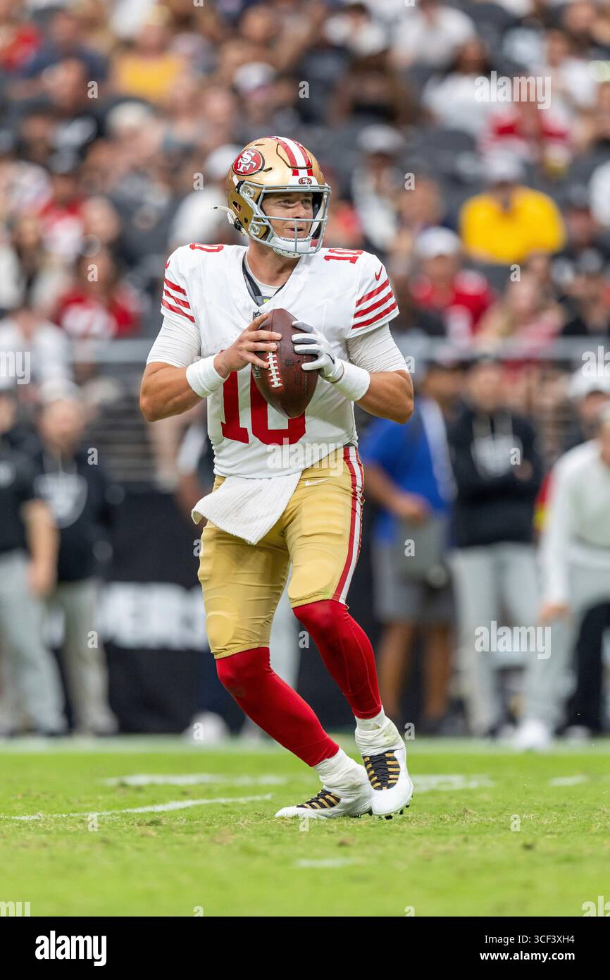 San Francisco 49ers quarterback Mac Jones (10) drops back to pass ...