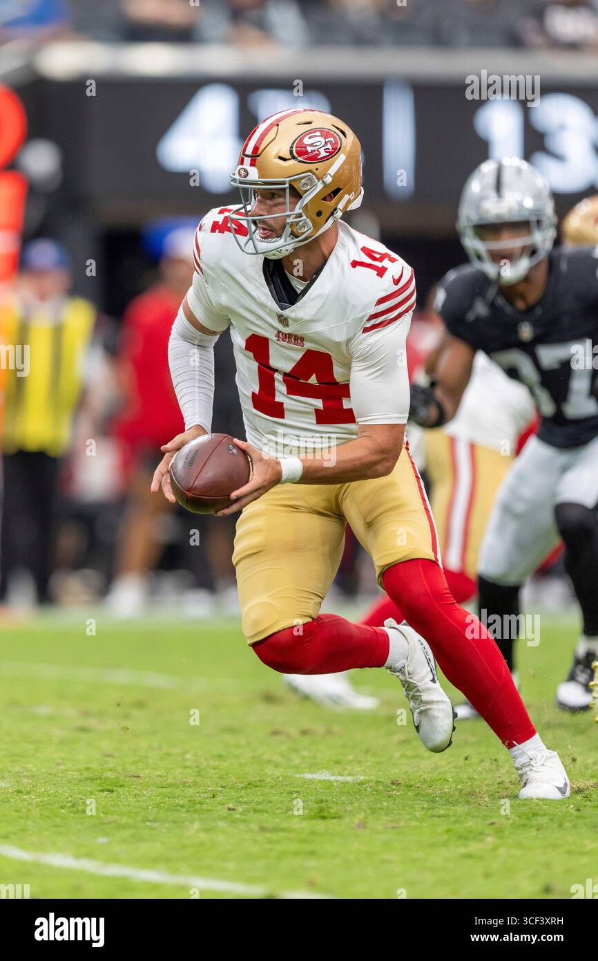 San Francisco 49ers quarterback Carter Bradley (14) turns to hand off ...