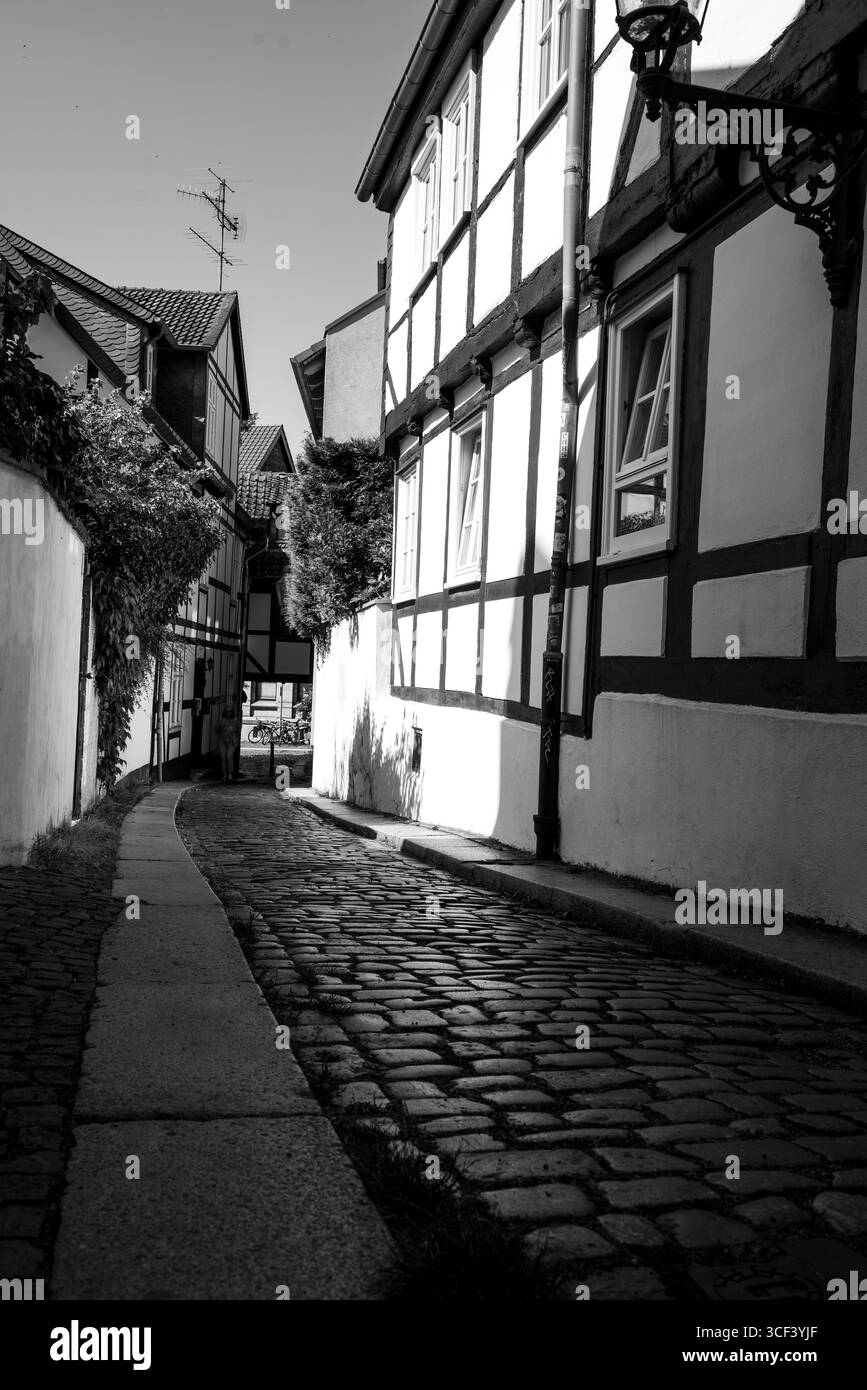 European medieval cobblestone street Black and White Stock Photos ...