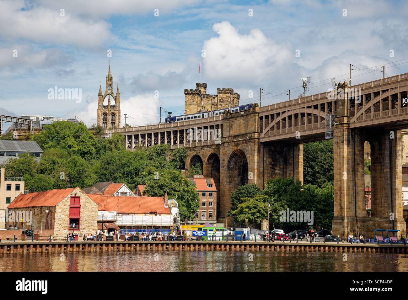 The High Level Bridge passes over the riverside of Newcastle upon Tyne ...