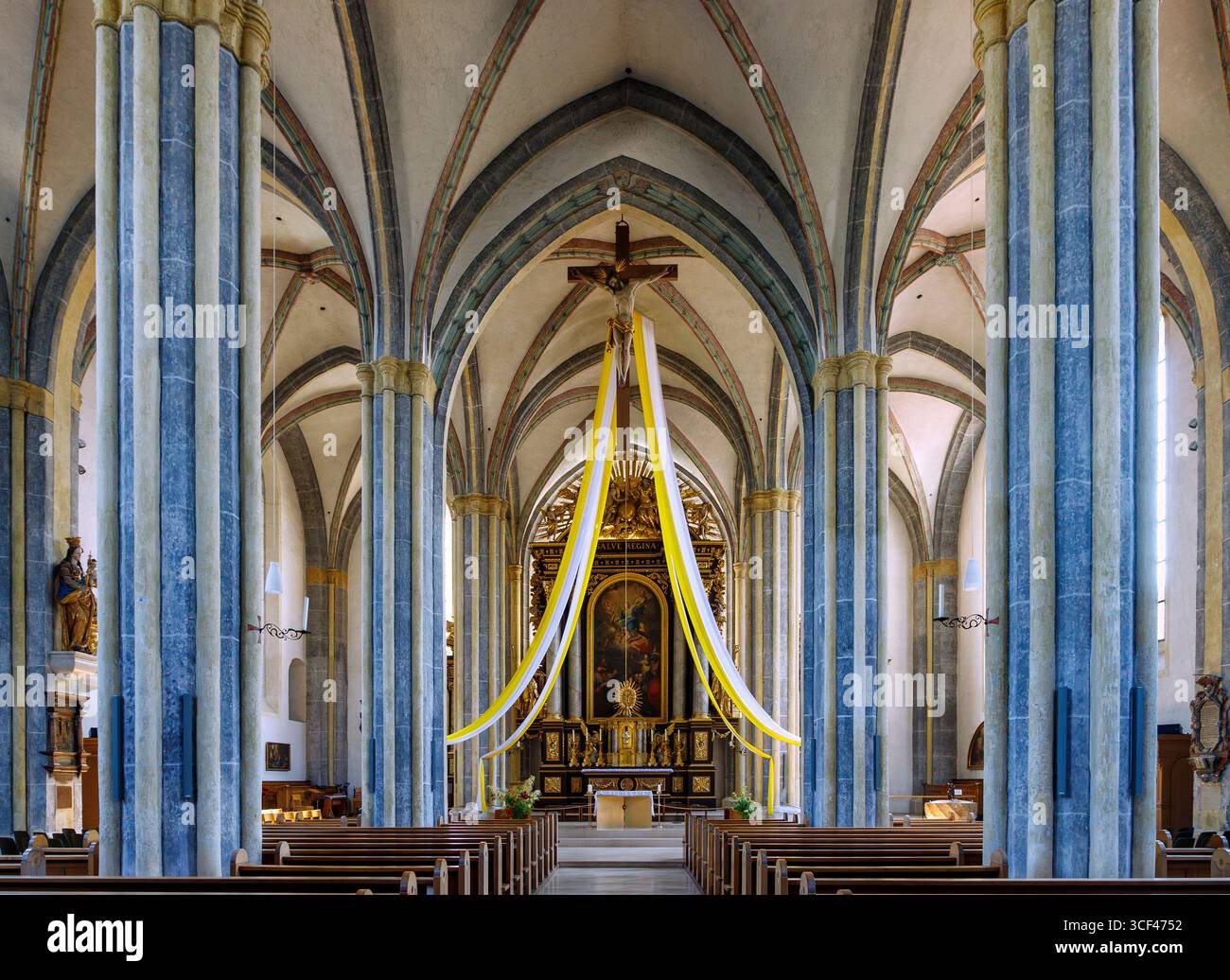 Interior of the Gothic collegiate church of the Assumption of the ...