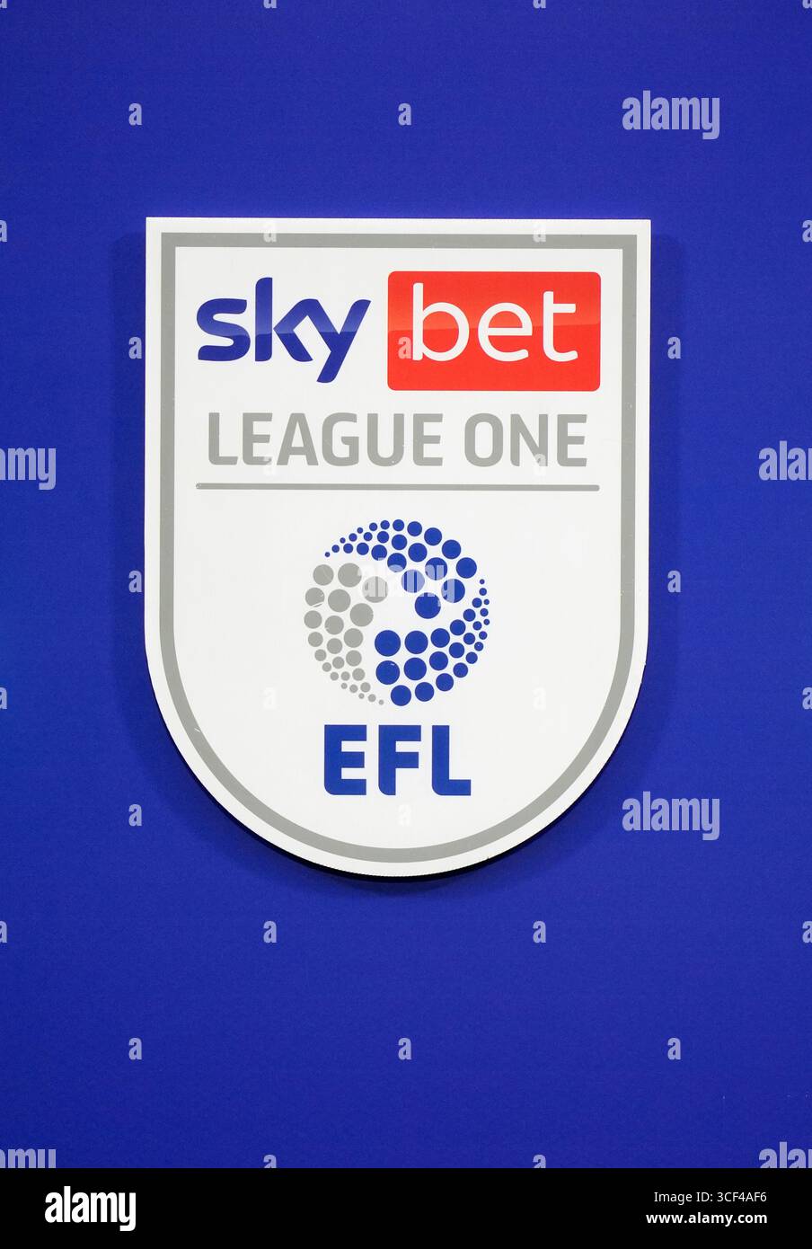 A close up of a Sky Bet League One logo on an advertisement board ...