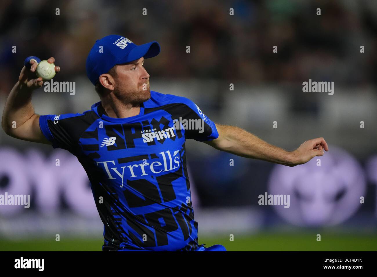 London Spirit's Liam Dawson throws a ball while fielding during The ...