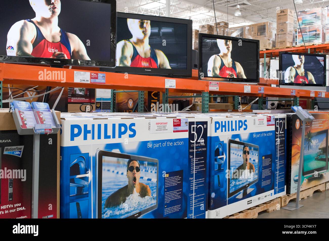 Large flat panel televisions on display at a Costco Warehouse. Costco ...