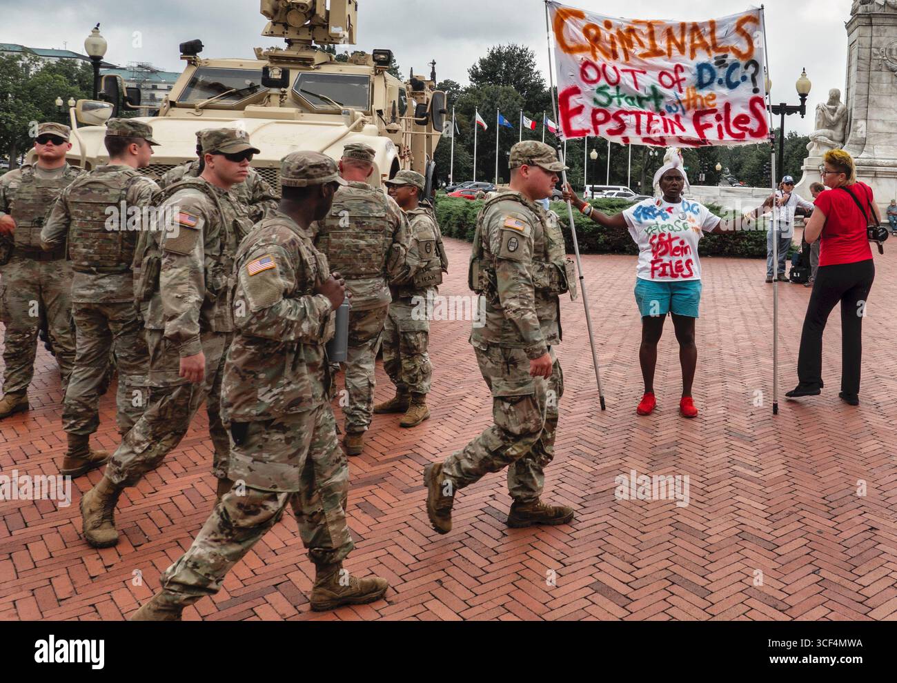 WASHINGTON, DC - AUGUST 20: National Guard troops march past a ...