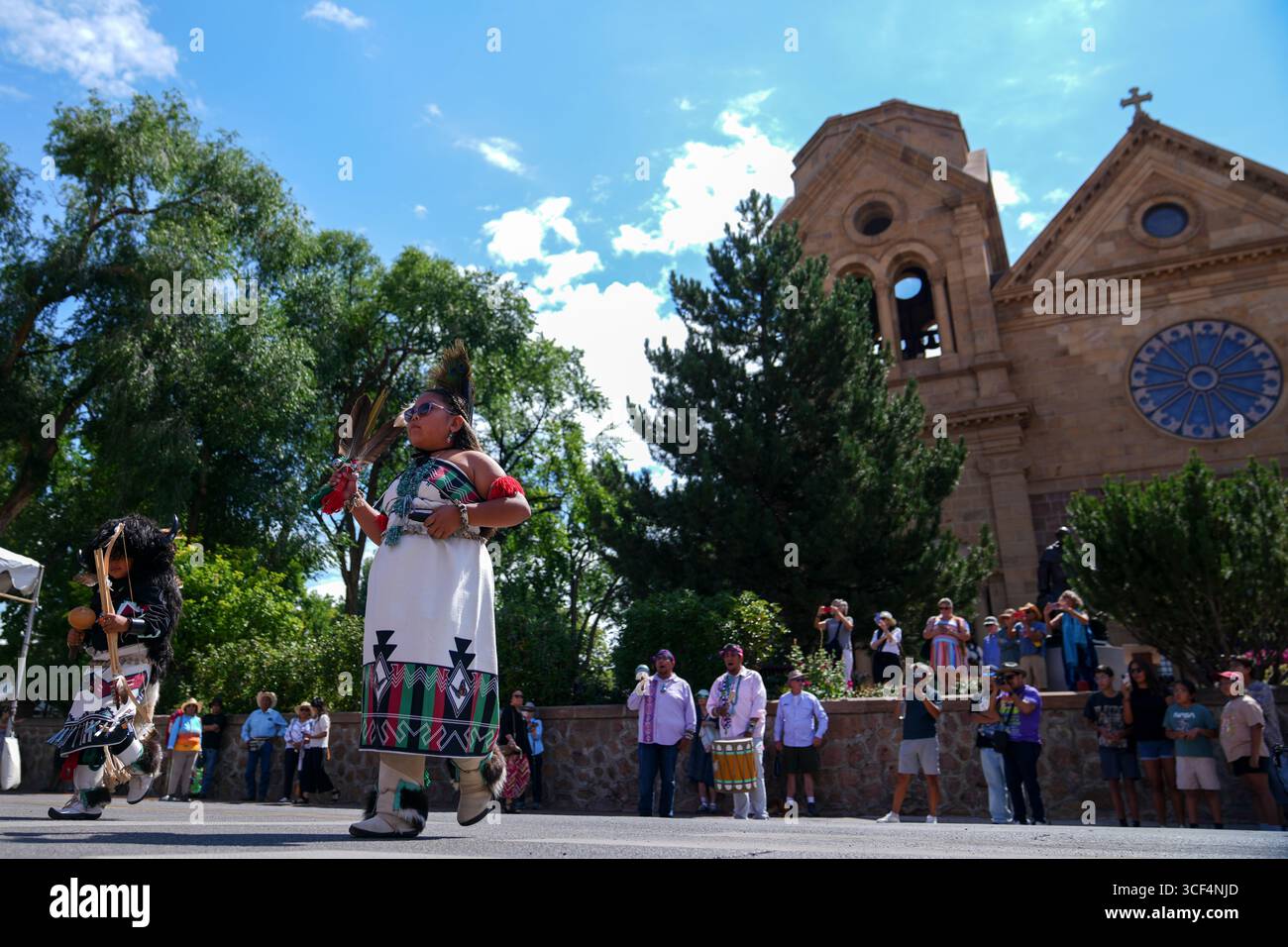 Dancers perform in front of the Cathedral Basilica of St Francis of ...