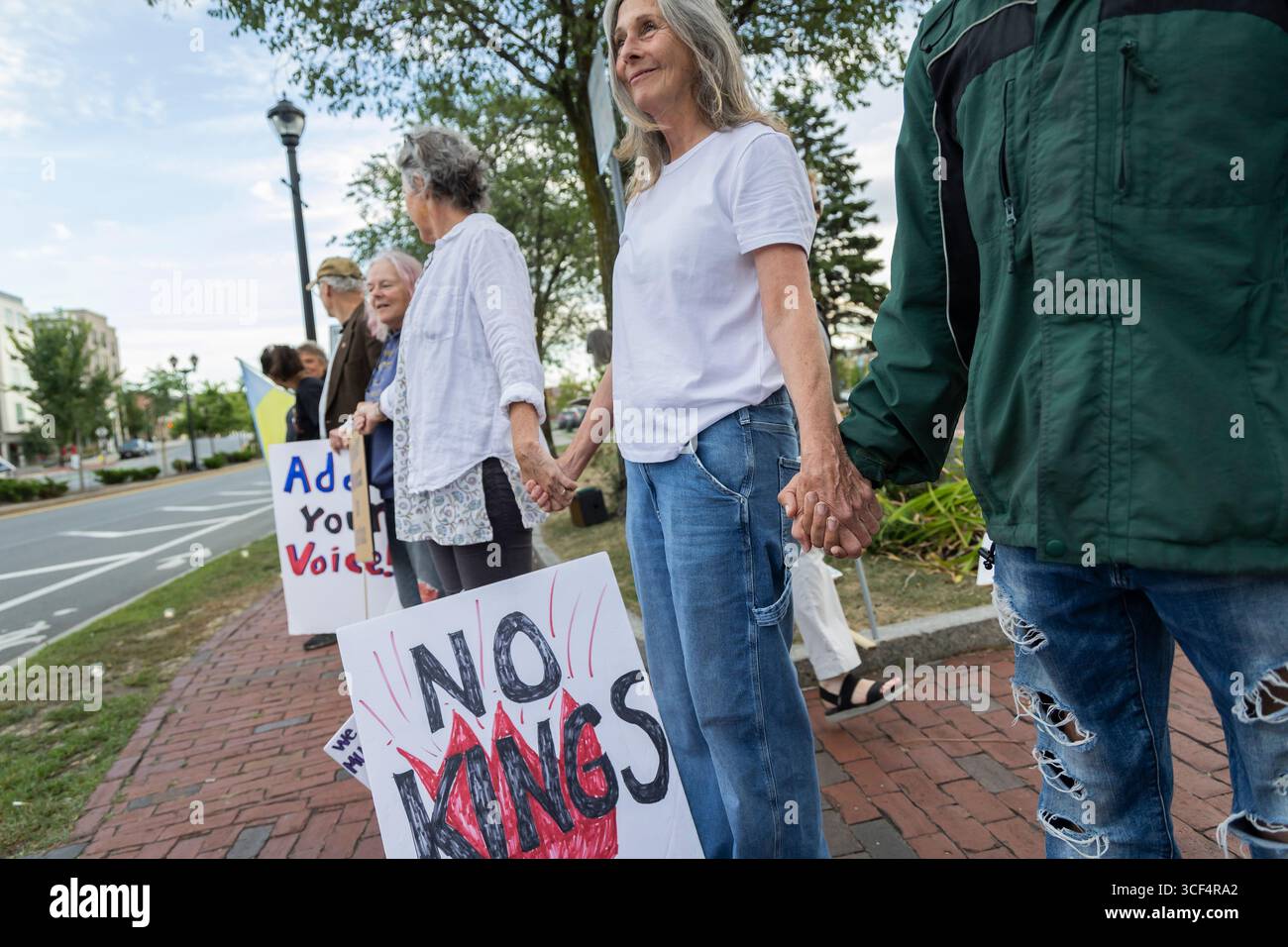 August 19, 2025. Salem, MA. Hands Across Riley: Human Chain for Peace ...