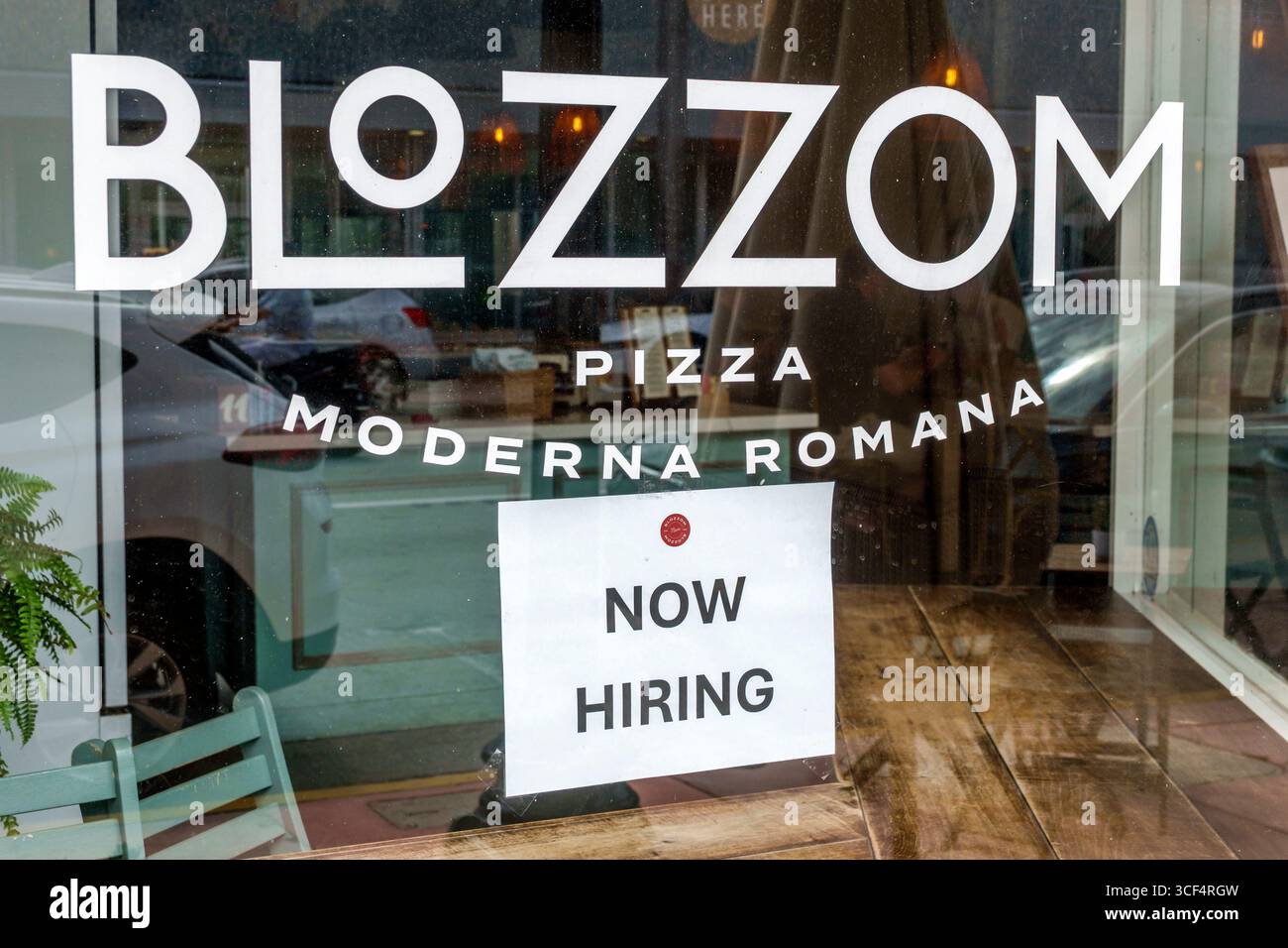 Workplace hiring notice front entrance business urban street hi-res ...