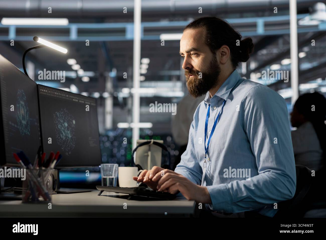 Software developer in data center using AI powered tech to run ...