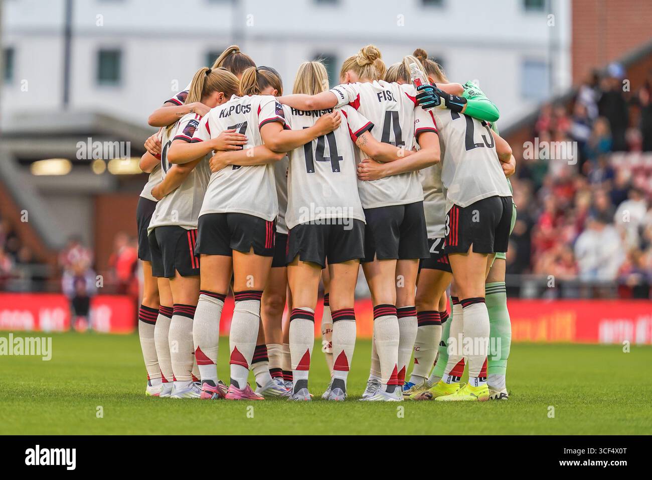 LEIGH, ENGLAND - August 20: Liverpool FC team huddle pre game ahead of ...