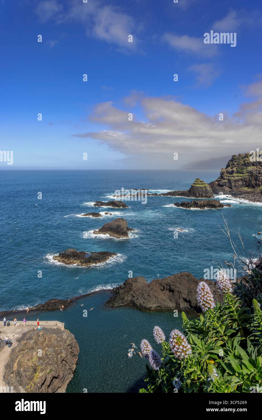 Natural swimming pools on the cliffs of seixal on madeira hi-res stock ...