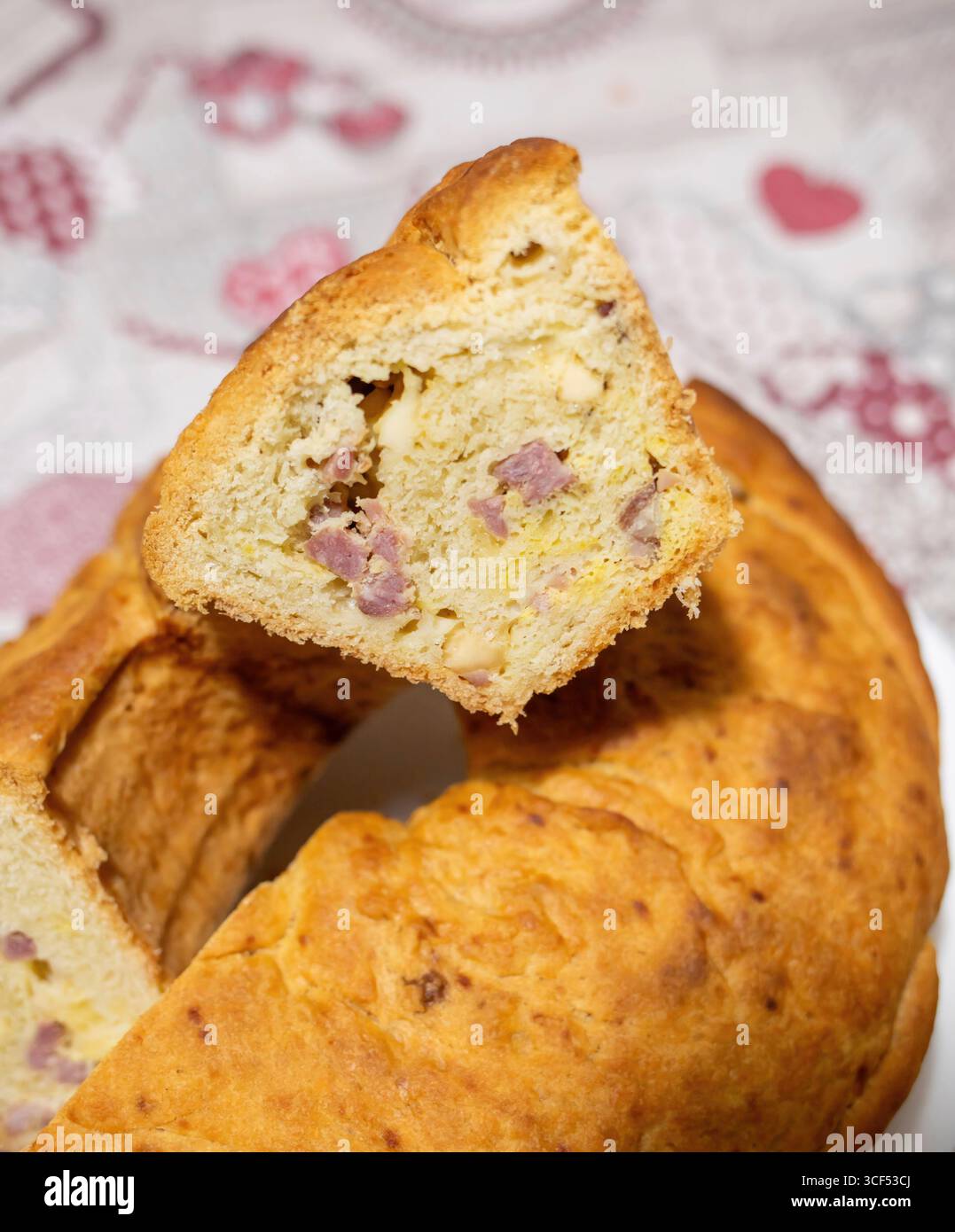 A traditional savory cake filled with salami hi-res stock photography ...