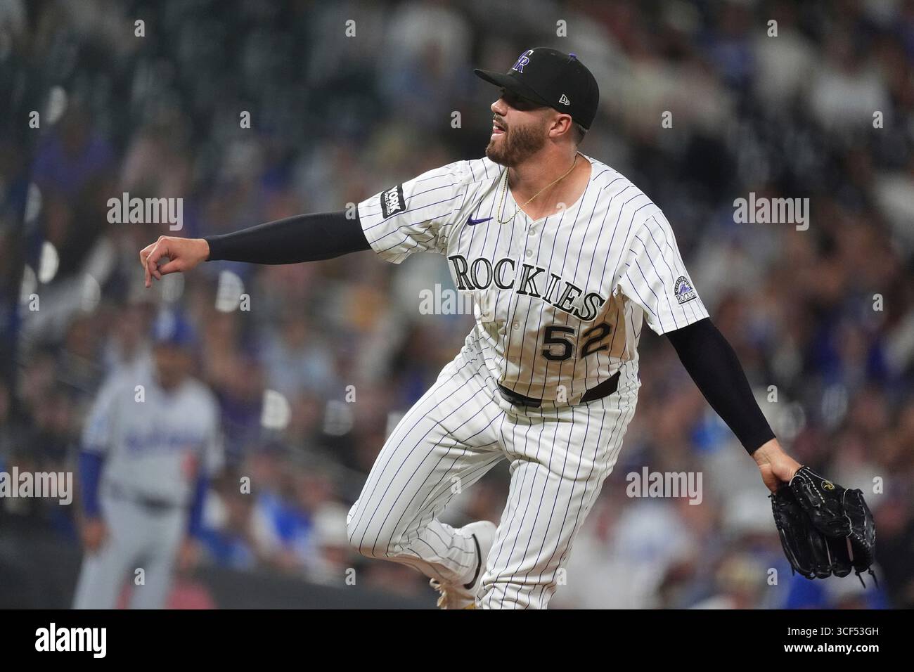 Colorado Rockies relief pitcher Dugan Darnell (52) in the ninth inning ...