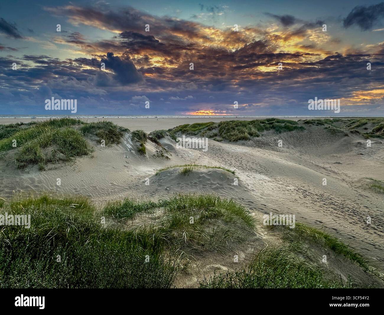 Sunset on the beach in Romo, Denmark Stock Photo - Alamy