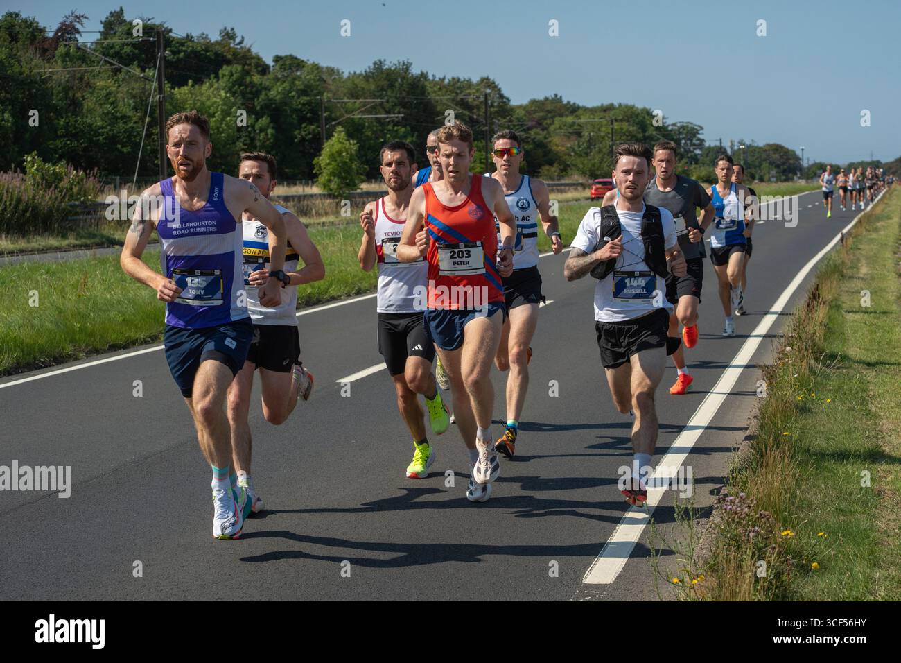 Group of competitors in the 2025 Scottish Half Marathon, including Tony ...