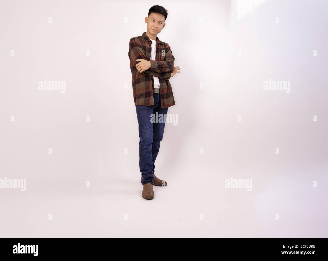 Man standing confidently in hi-res stock photography and images - Alamy