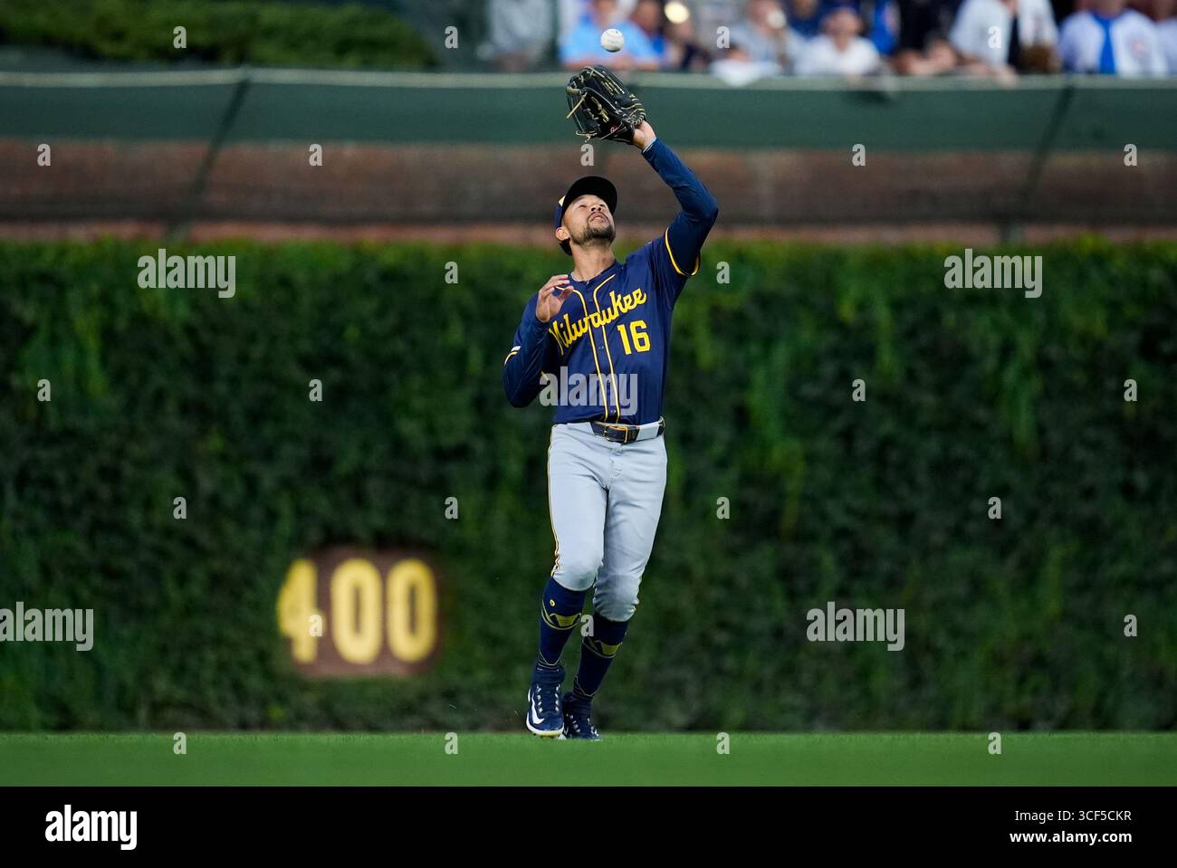 Milwaukee Brewers center fielder Blake Perkins catches a fly out from ...