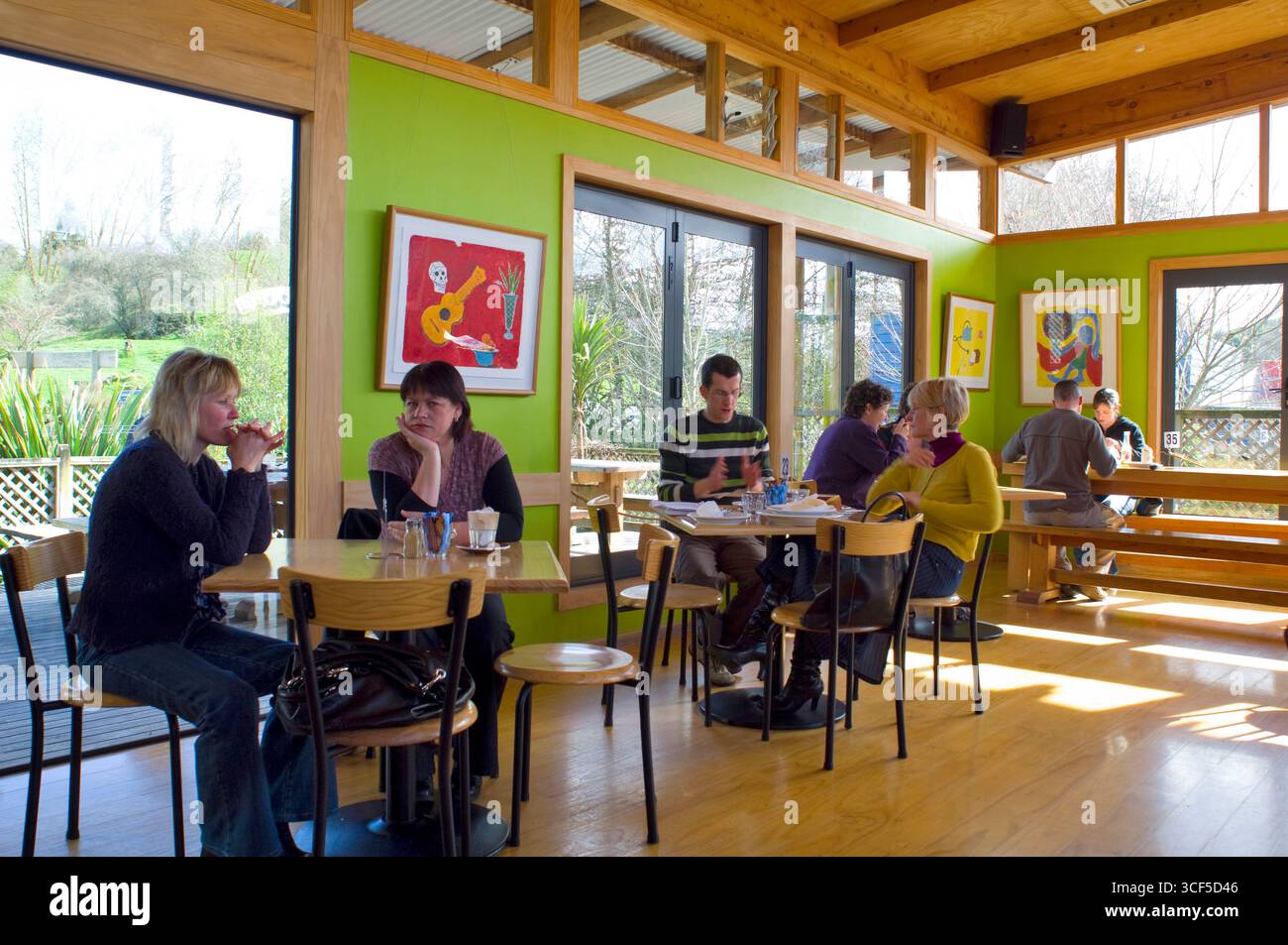 People sitting a tables enjoying lunch at Bosco Café, Te Kuiti, Waikato ...