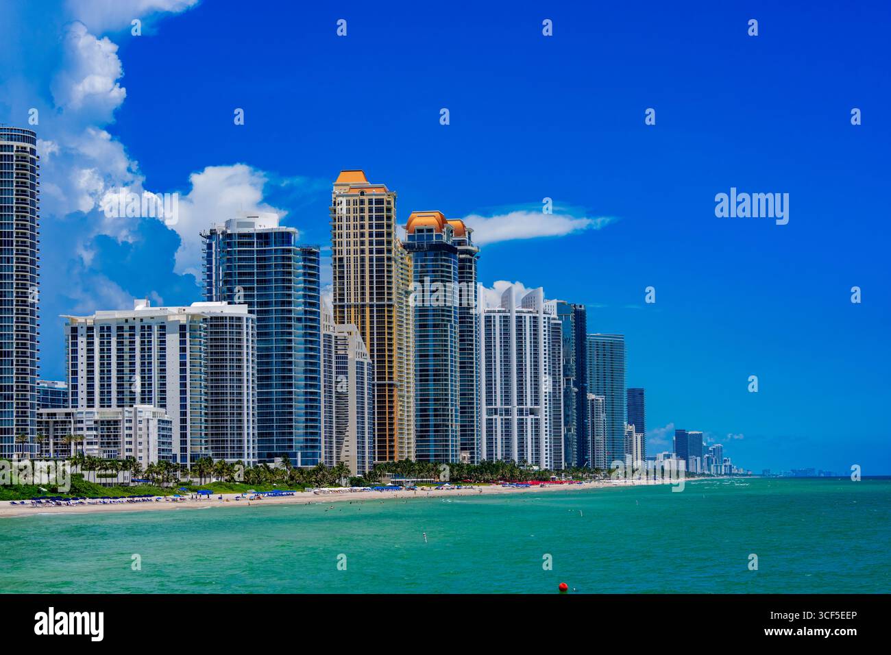 Low aerial photo Sunny Isles Beach Florida oceanside towers Stock Photo ...