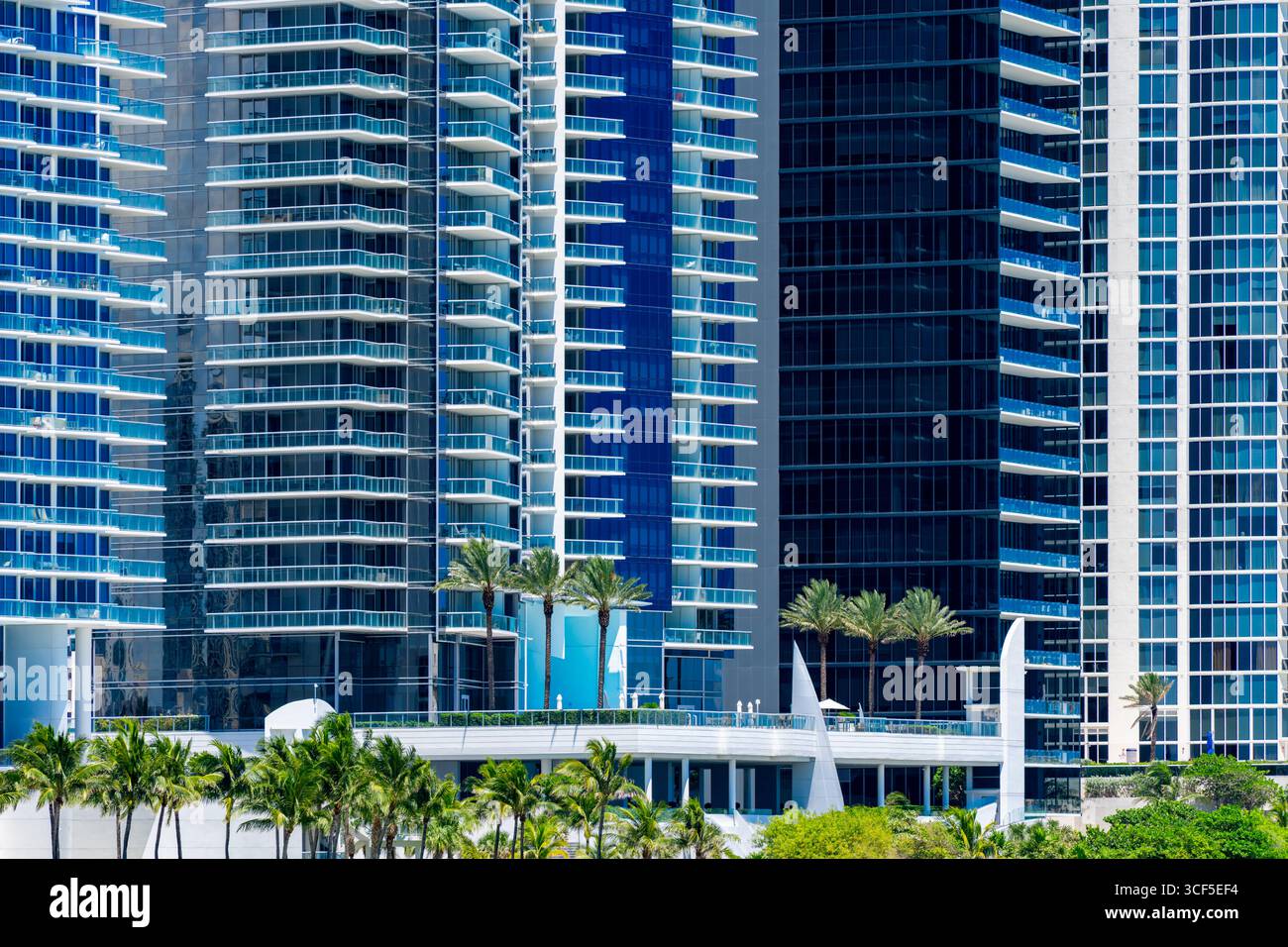 Sunny Isles Beach Florida buildings with oceanfront tropical oasis pool ...