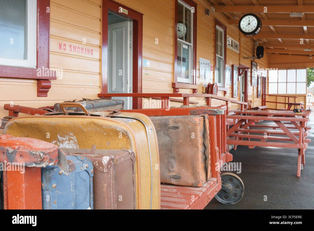 Waihi New Zealand - August 18 2025; Vintage bags on trolley on platform ...
