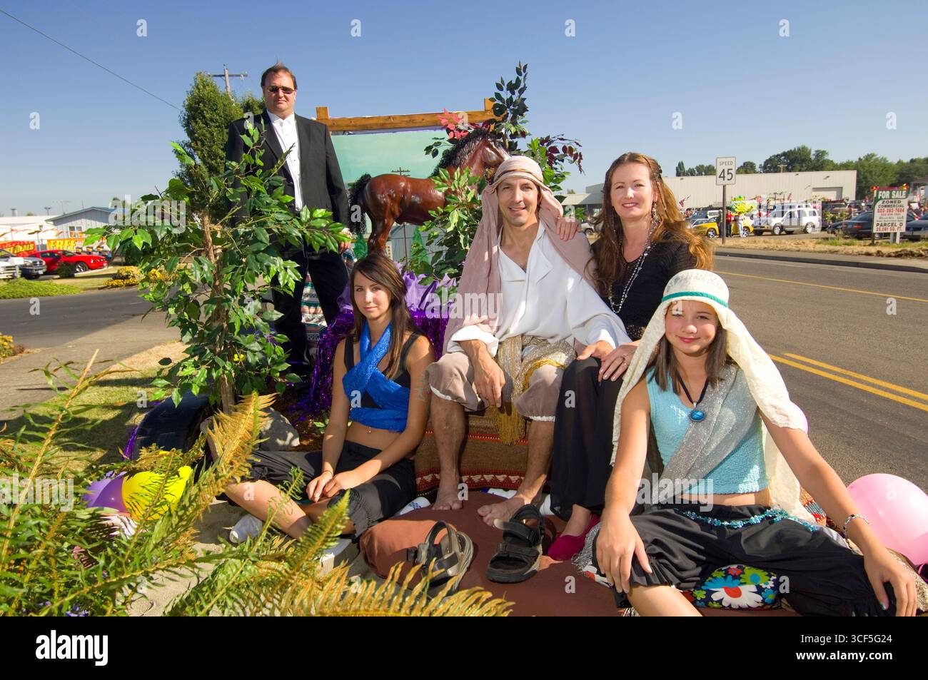 Parade float with vignette of Homer Davenport dress in Arabian costume ...