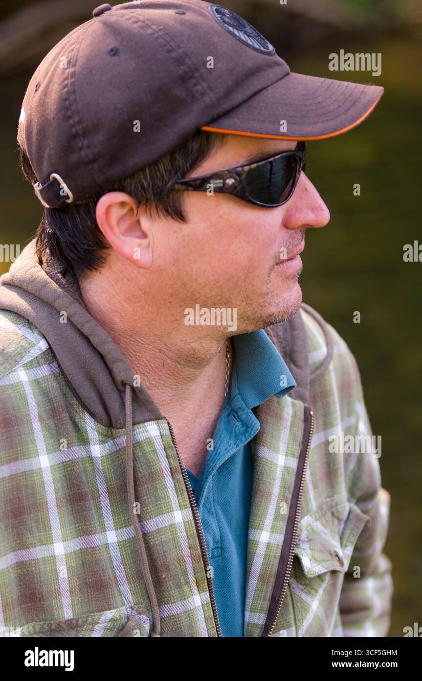 Fisherman standing in the McKenzie River wearing waders fishing for ...