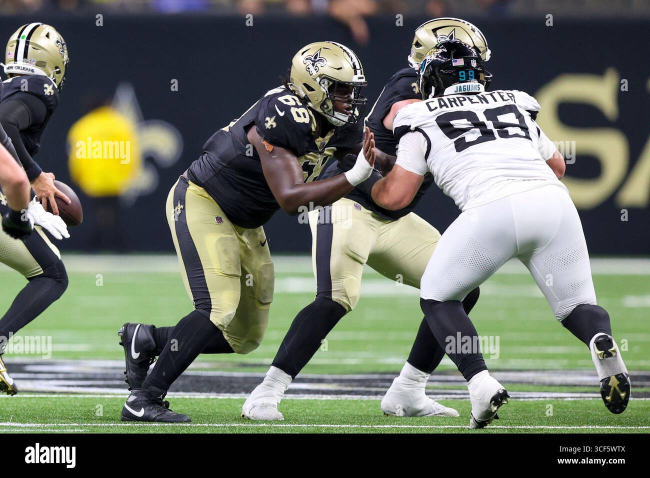 New Orleans Saints guard Torricelli Simpkins III (68) blocks ...