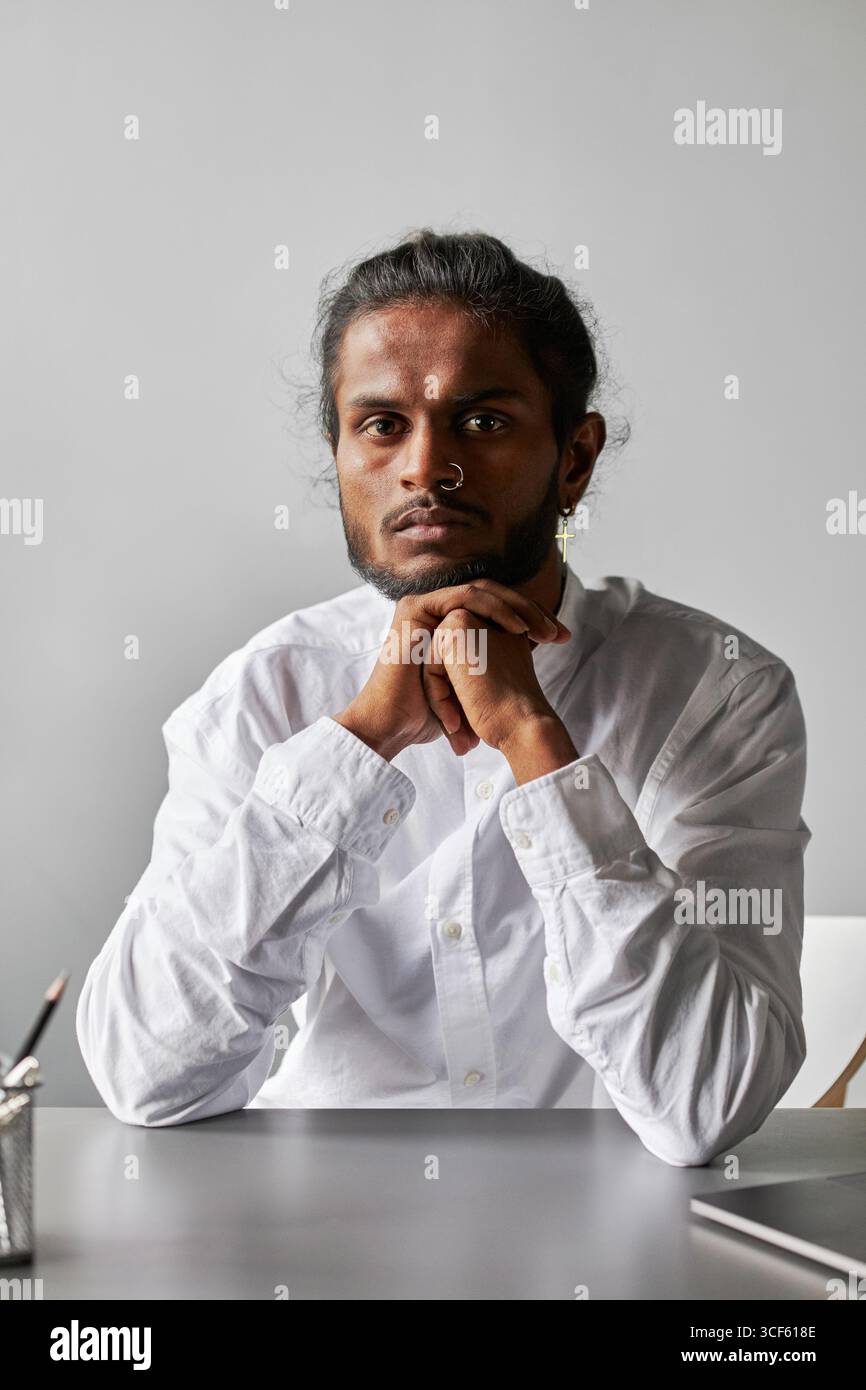 Handsome indian man piercing wearing hi-res stock photography and ...