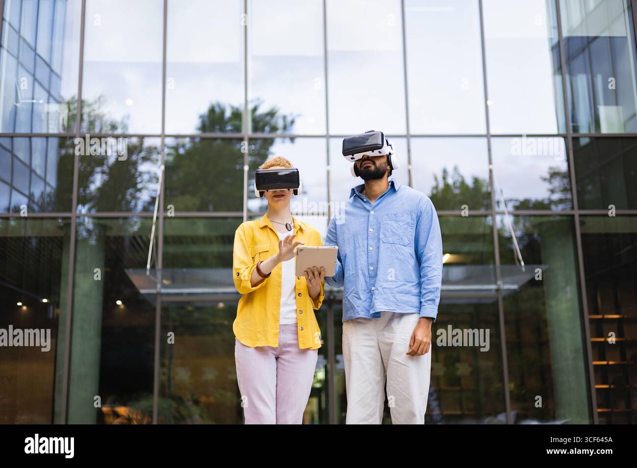 Using vr headsets diverse female hi-res stock photography and images ...