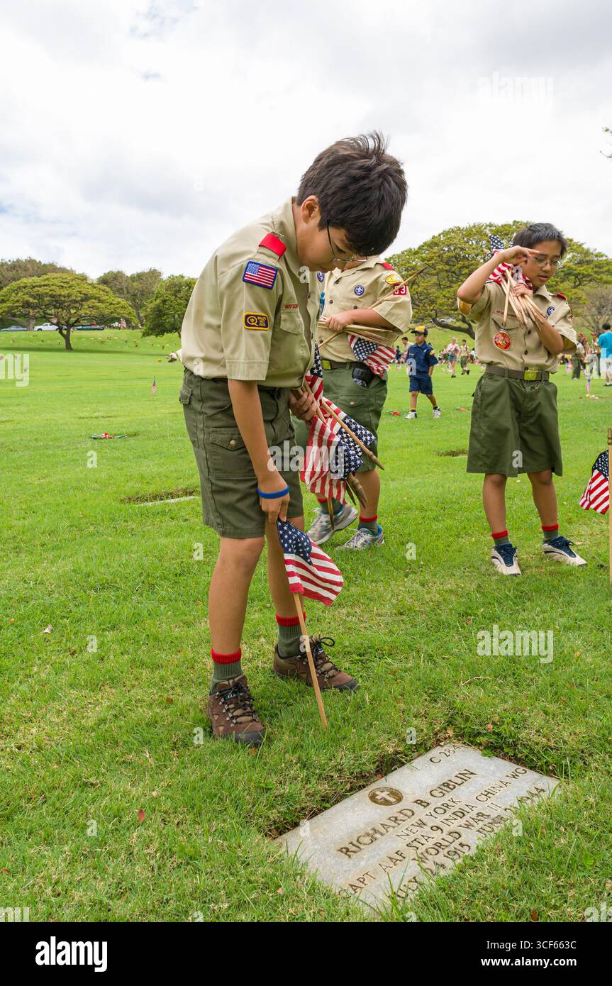 Boy Scouts of America doing a good deed by placing and American flag ...