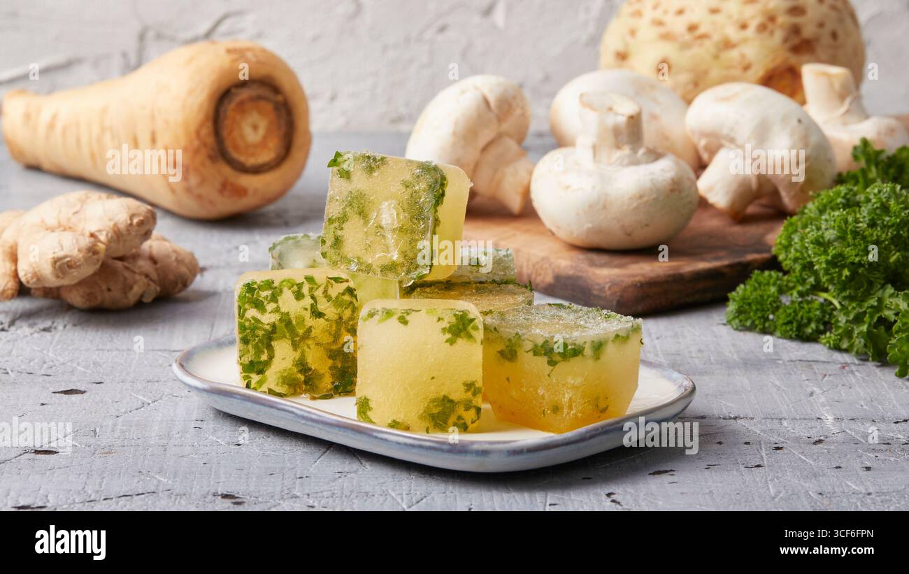 Frozen vegetable broth cubes Stock Photo - Alamy