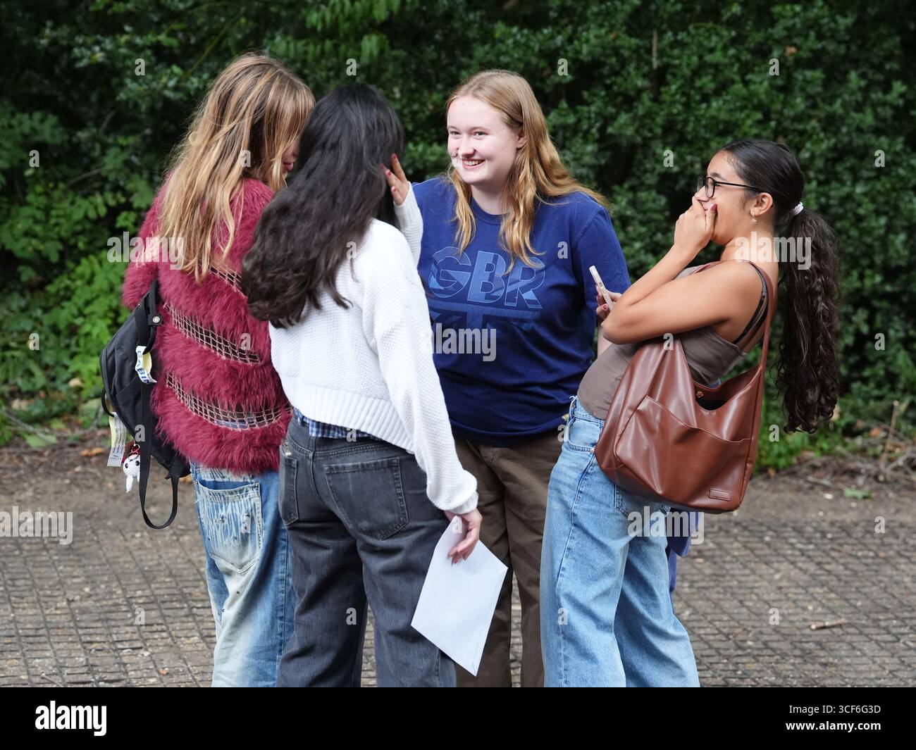 Pupils at Putney High School in London receiving their GCSE results ...