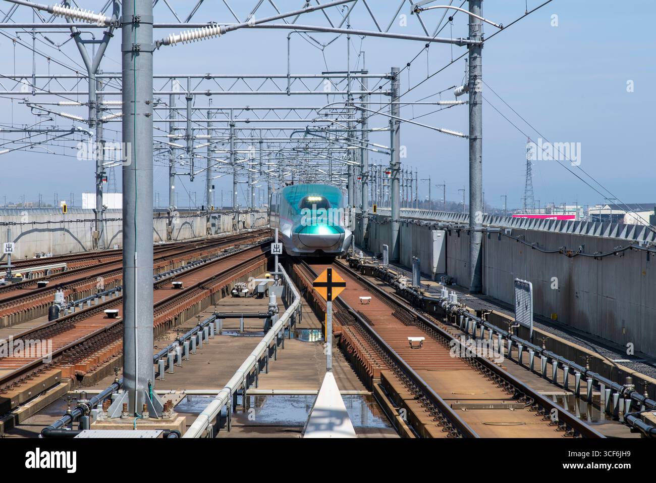 Aomori, Japan-May 2, 2025; The Shinkansen or bullet train entering the ...