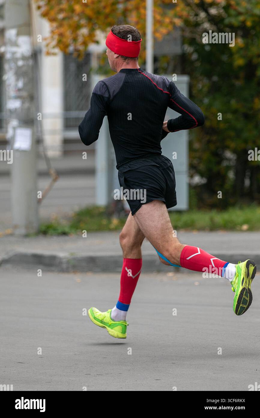 Athlete in blue compression hi-res stock photography and images - Alamy