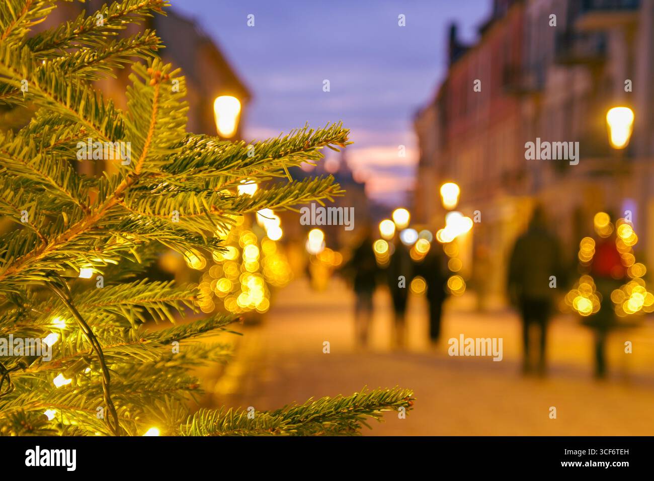 Blurred zoom out background city street with Christmas illuminations ...
