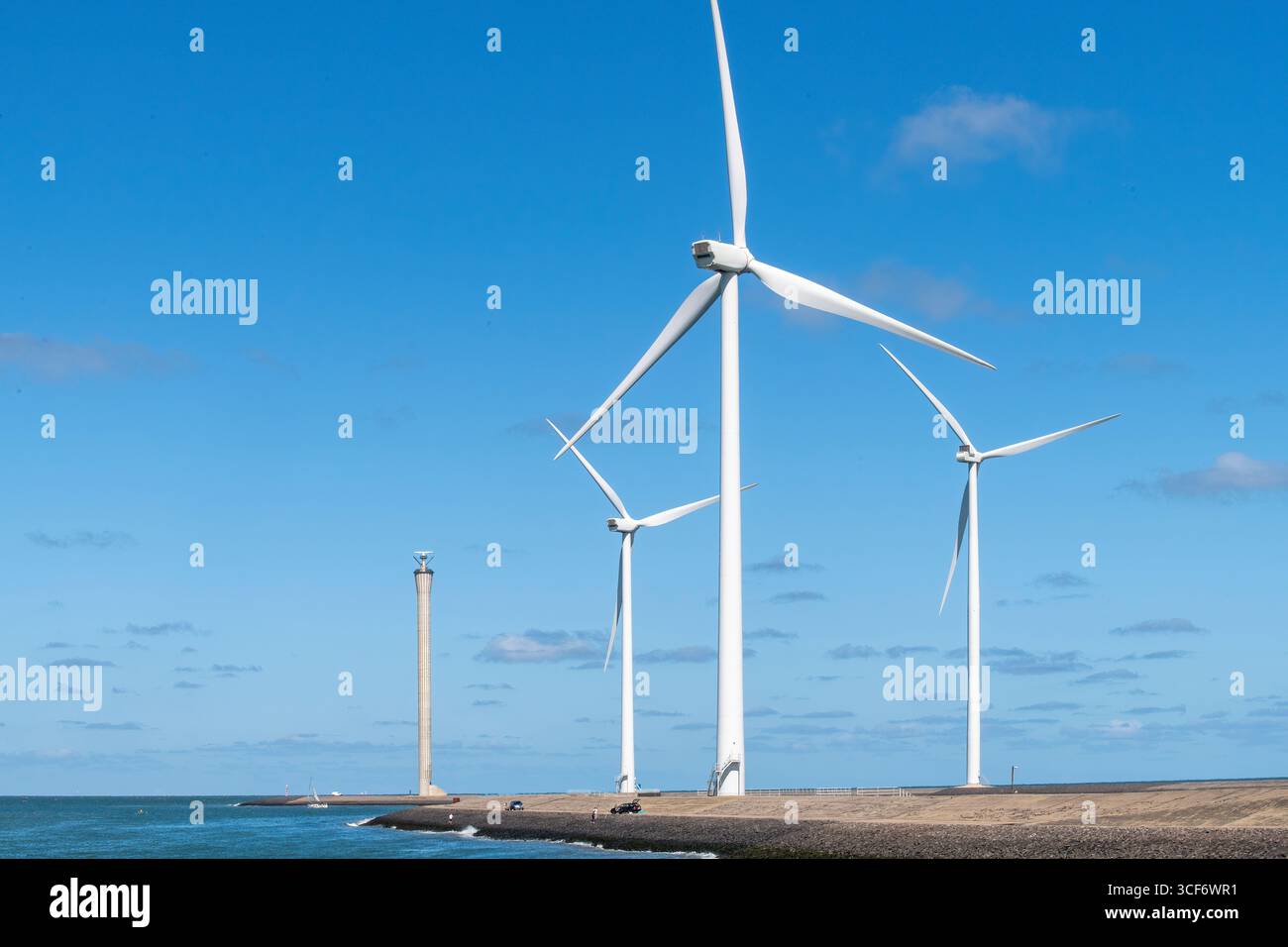 Modern wind turbines on the breakwater of former working island Neeltje ...