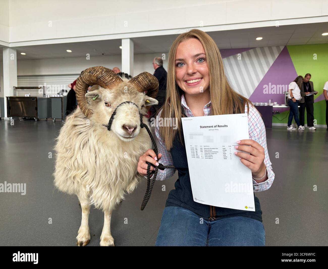 STUDENT DETAILS PIXELATED BY PA PICTURE DESK Milly Johnson, 16, and her sheep Kevin receiving ...