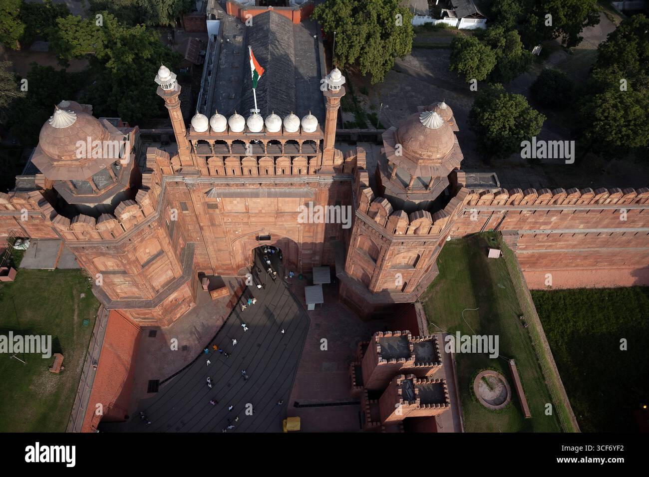 Aerial view of the Red Fort's imposing red sandstone walls under a ...