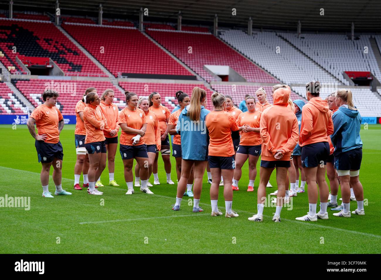 England players huddle during a team run at the Stadium of Light ...