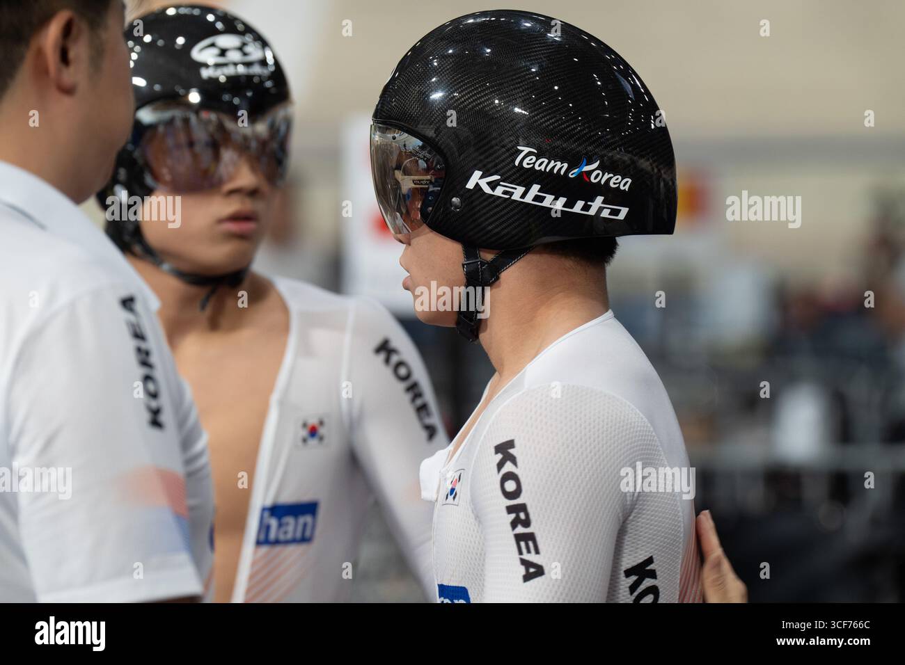 Jaeho Jung, Taeho Choi, Wooju Jeon competing in the Men Junior ...