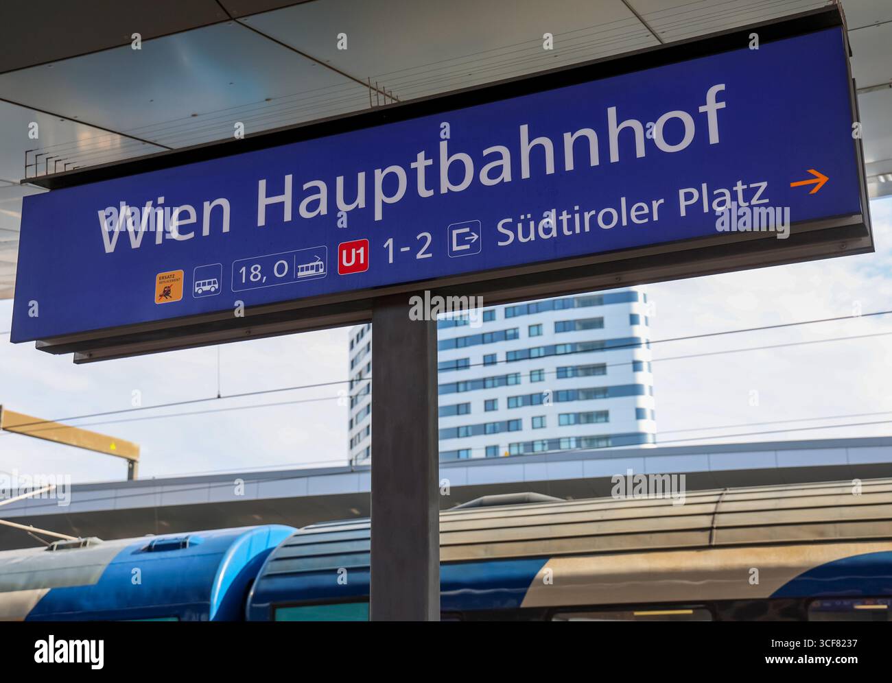 Vienna, Austria - 10. July 2025: Blue Wien Hauptbahnhof sign with ...