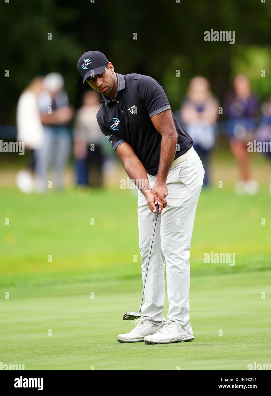 Aaron Rai putts on the 4th green during day one of the Betfred British ...