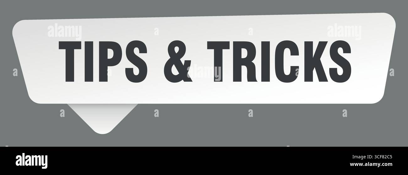 tips & tricks white sticker isolated on gray background. tips & tricks ...