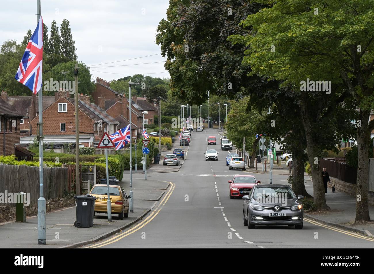 Rednal, Birmingham. 21st Aug, 2025. Union and St George's Flags are ...
