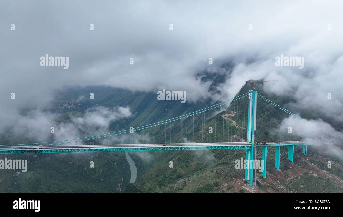 QIANXINAN, CHINA - AUGUST 21, 2025 - Trucks were driven in batches onto ...